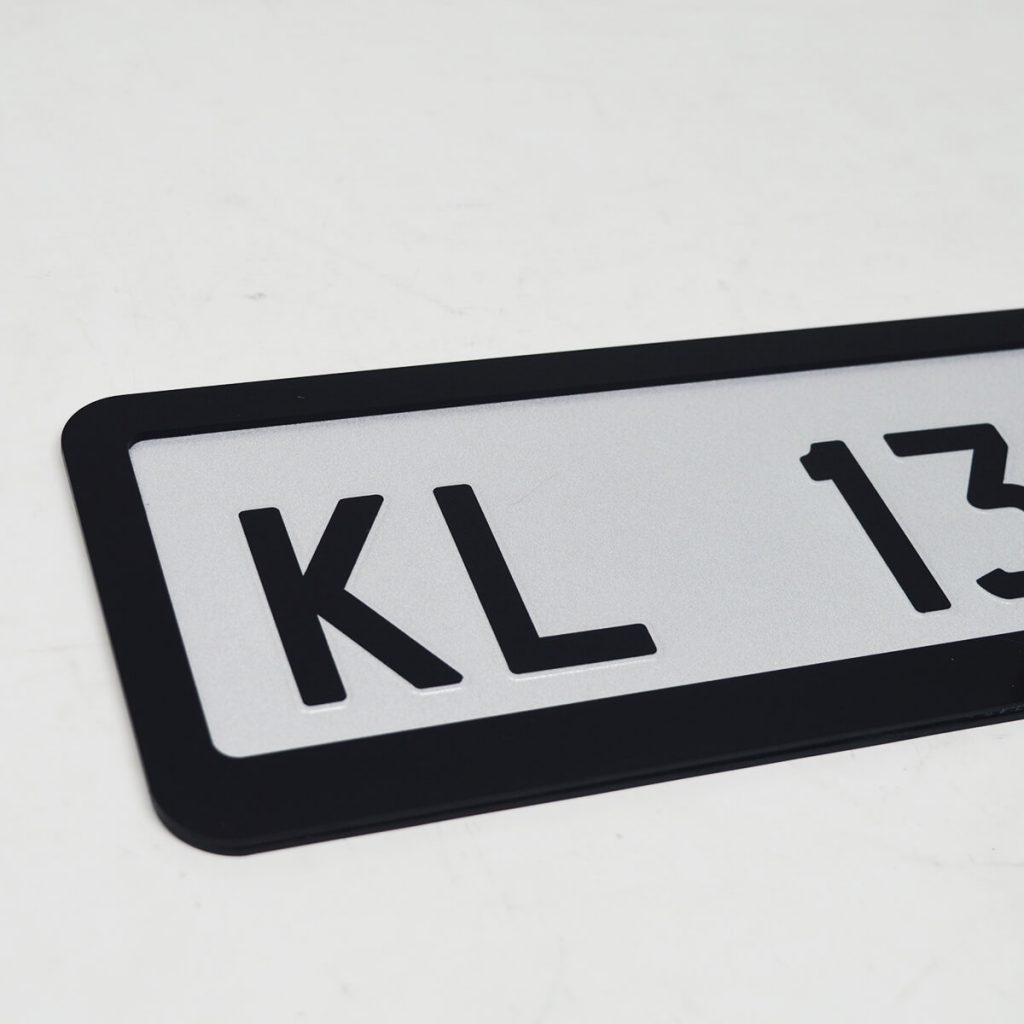 Formula One Sticker Punching Number Plate - NPD | NumberPlateDesign.com